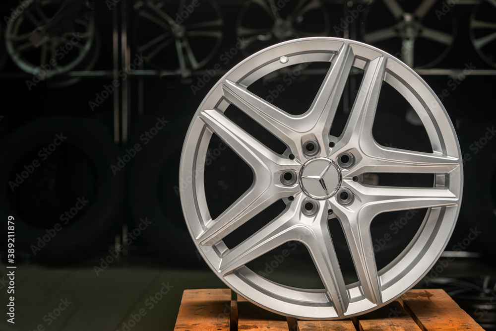 Mercedes Benz logo aluminum cast wheel, close-up, original silver wheel ...