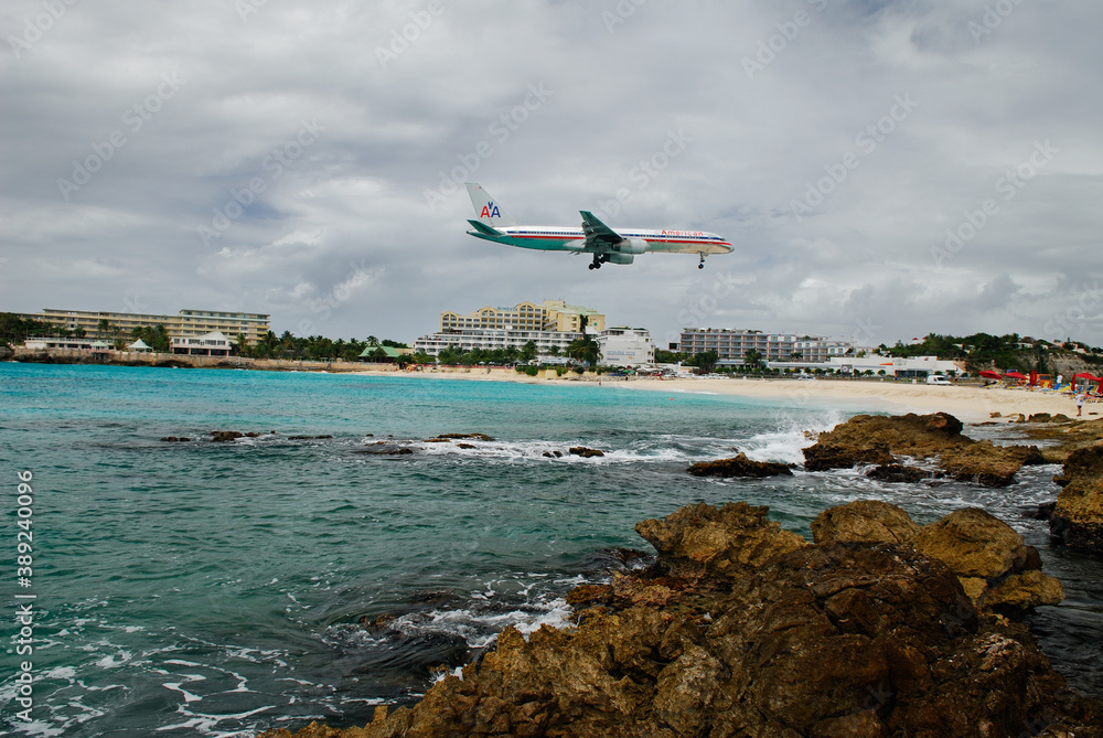 Large jetliner landing in St Maarten over Maho Bay beach St Martin ...