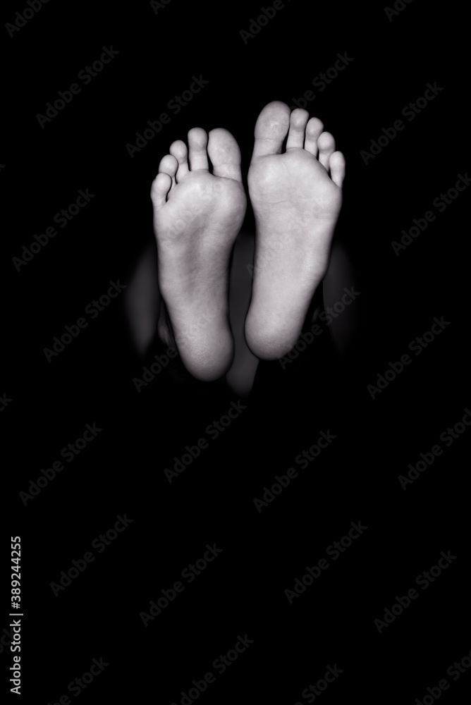 Feet of a girl, black and white with vertical black background Stock ...