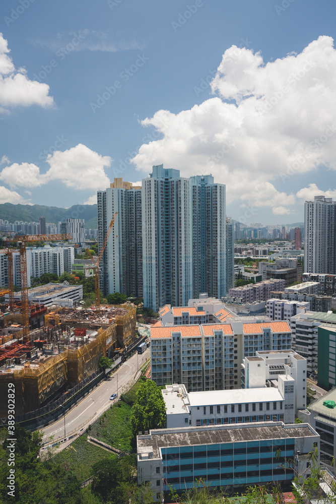 urban city skyline during clear summer day with densely packed ...
