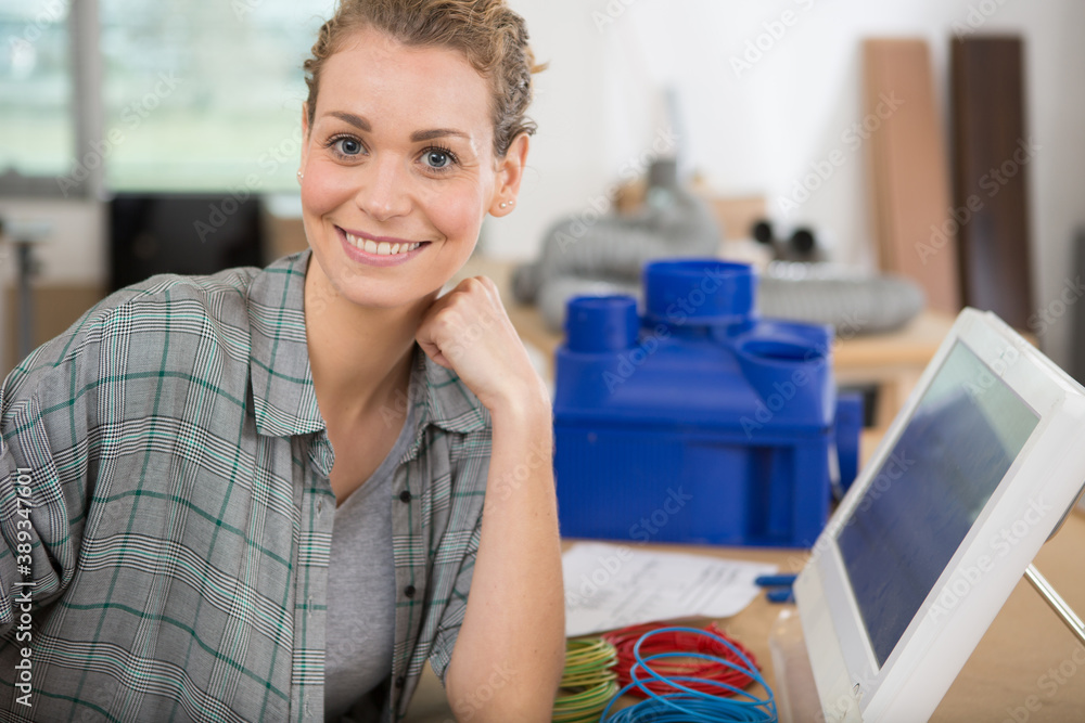 female hvac engineer posing and smiling Stock Photo | Adobe Stock