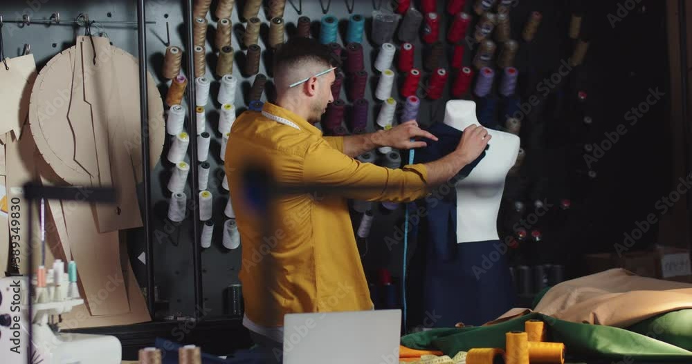 Video „Portrait of handsome young Caucasian man working in small studio ...