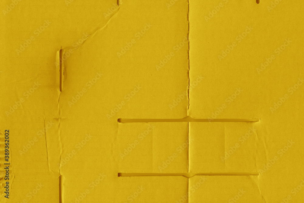 A yellow vintage rough sheet of carton. Recycled environmentally ...