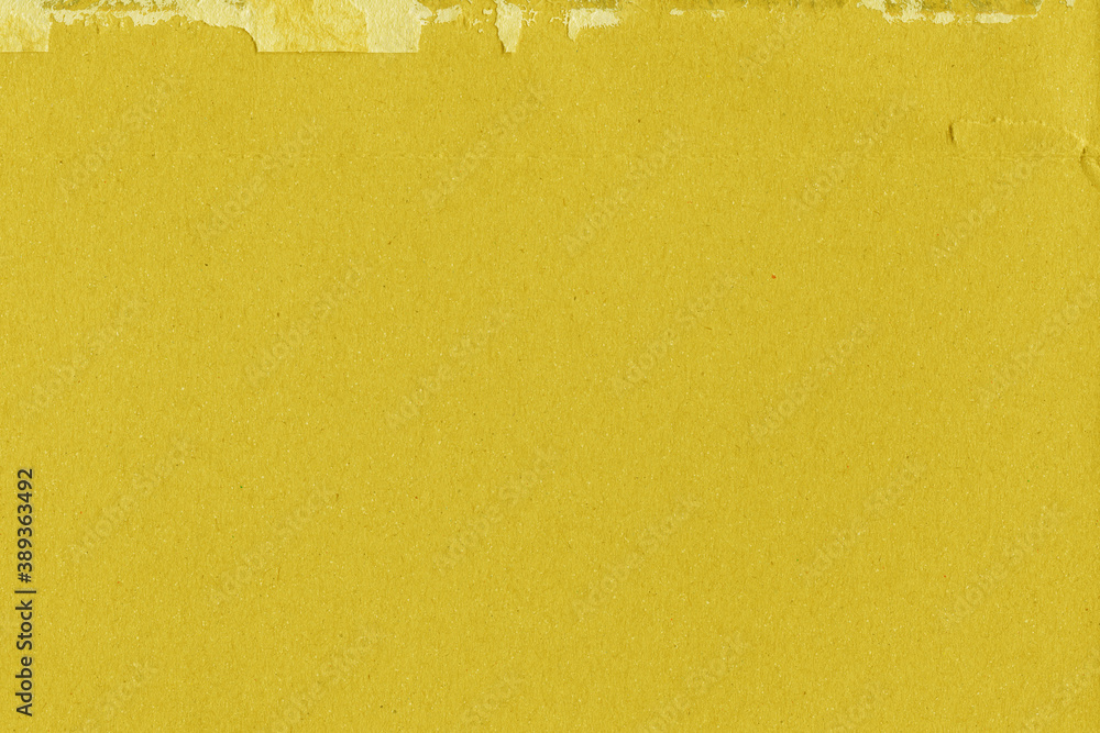 A yellow vintage rough sheet of carton. Recycled environmentally ...