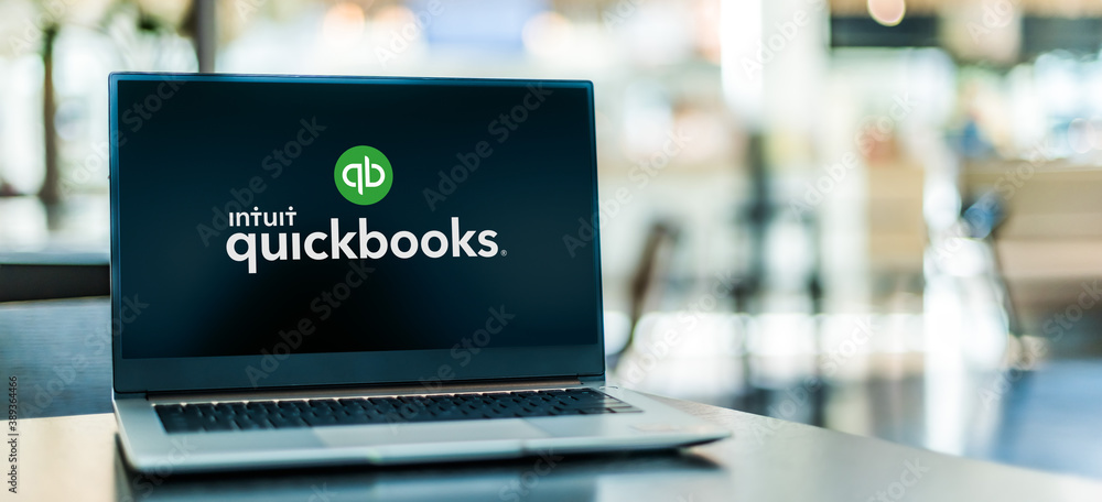 Laptop computer displaying logo of QuickBooks Stock Photo | Adobe Stock