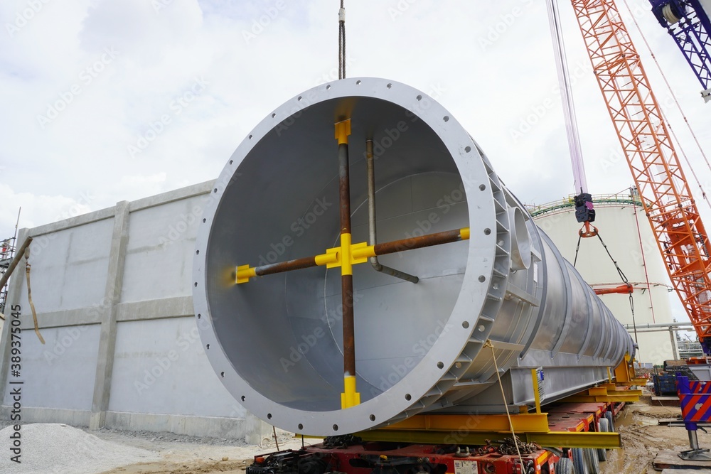 Heat recovery steam generator stack during lifting to installation as ...