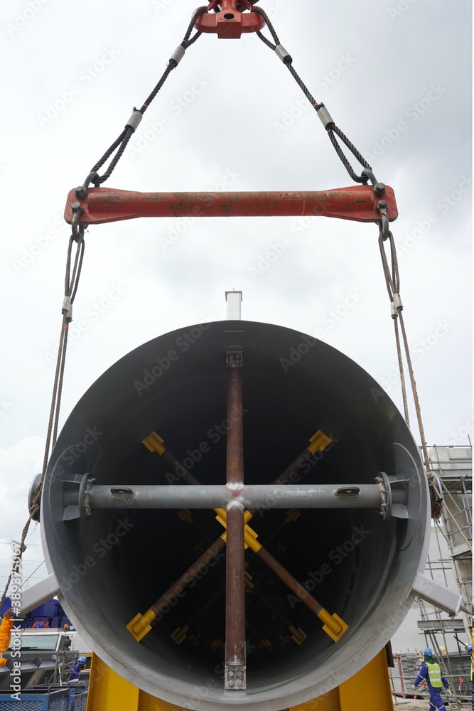 Heat recovery steam generator stack during lifting to installation as ...