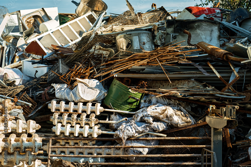Storage of scrap metal. Piles of scrap metal for recycling in an open ...