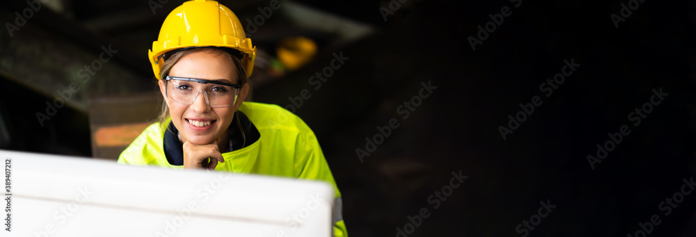 Female Quality control inspector checking workers at factory. Woman ...