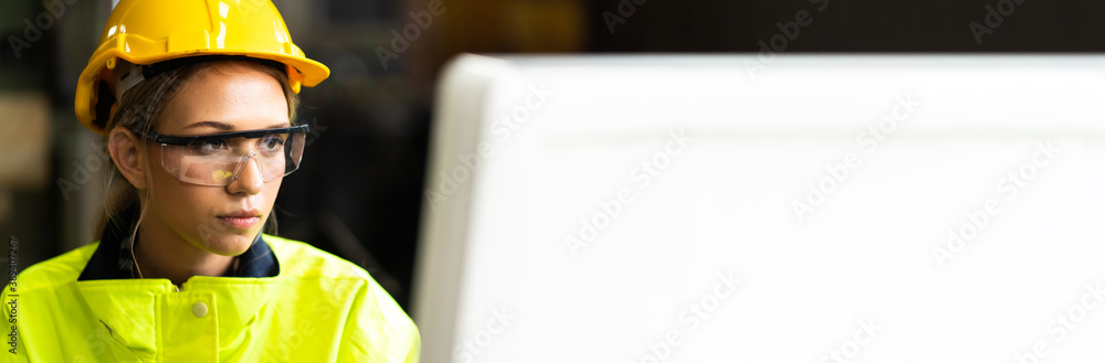 Female Quality control inspector checking workers at factory. Woman ...