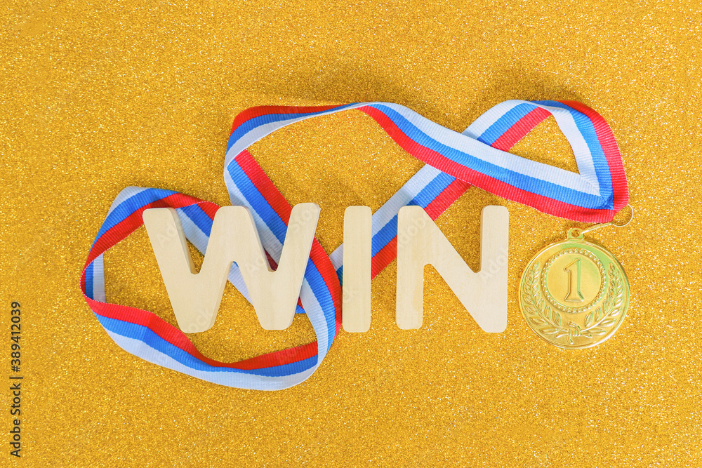 Inscription win and gold medal on a gold background. Award and victory ...