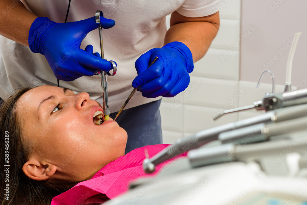 Local anesthesia, dentist carpal syringe injects the patient's gum ...