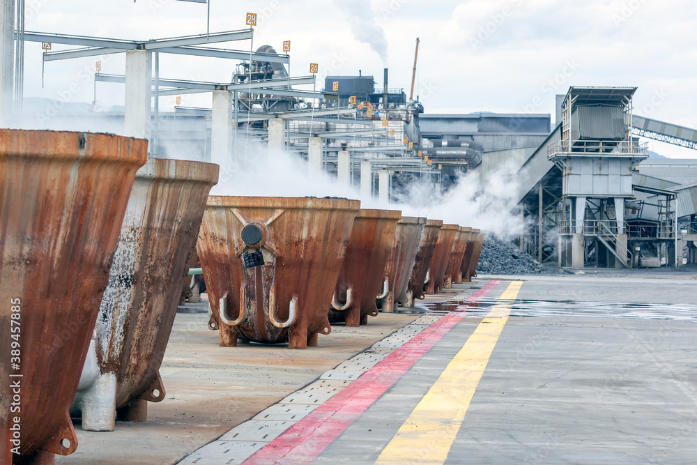 Hot slags in the melting pots in the copper processing factory. Copper ...