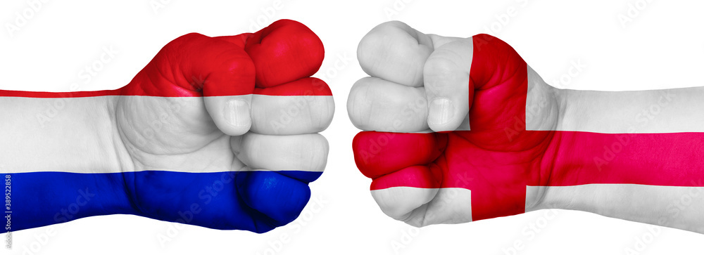 Two hands are clenched into fists and are located opposite each other ...