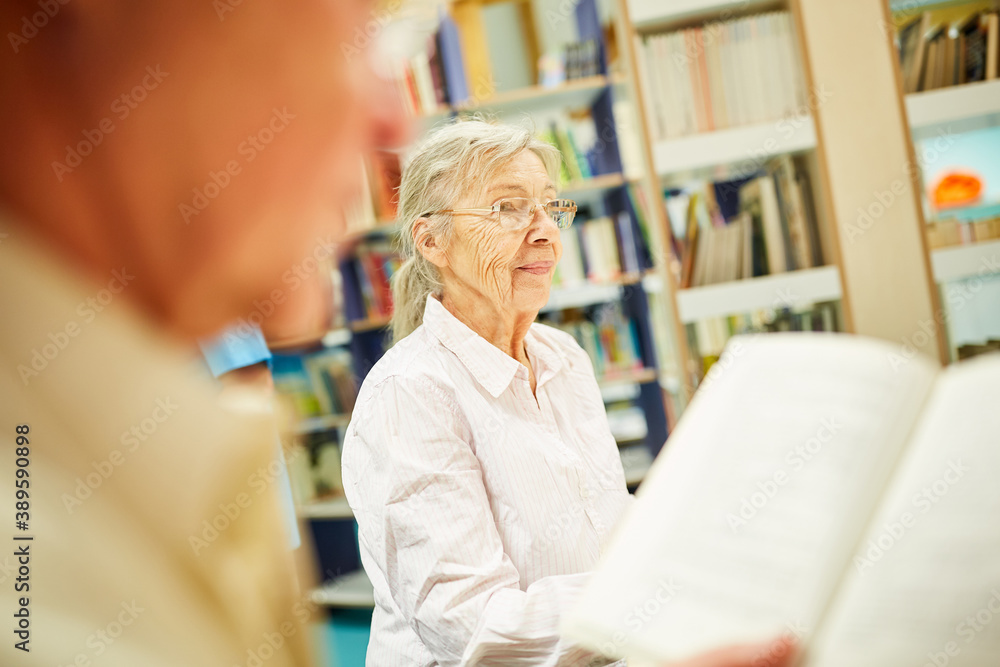 Seniors in a library in the retirement home Stock Photo | Adobe Stock
