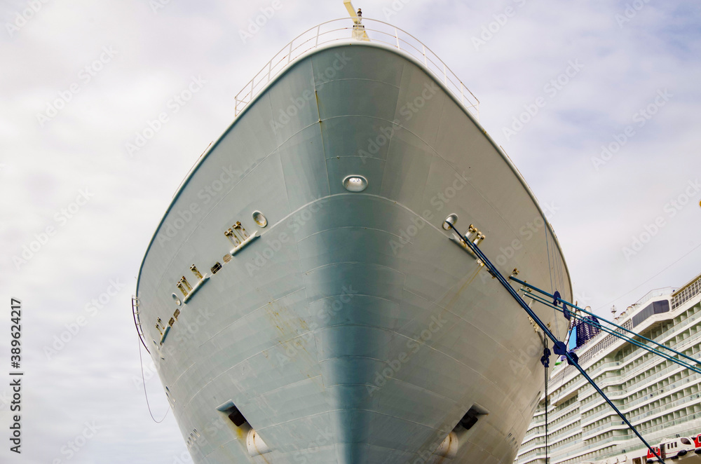 Huge and modern cruiseships or cruise ship liners line up in port of ...