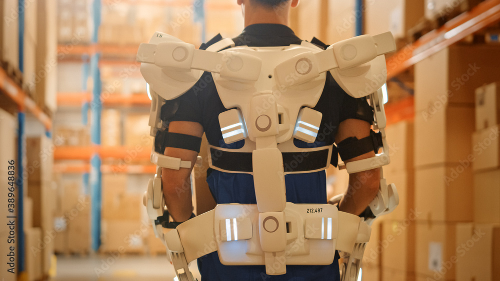 High-Tech Futuristic Warehouse: Worker Wearing Advanced Full Body ...