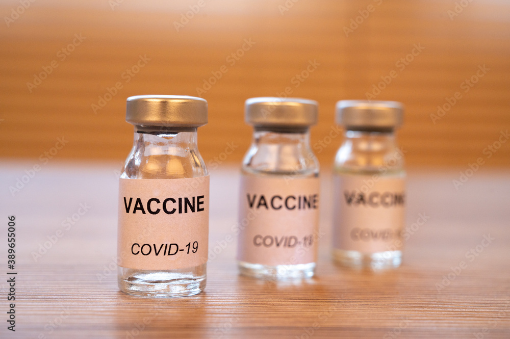 Coronavirus Covid-19 Vaccine vial Put on the doctor's desk Stock Photo ...