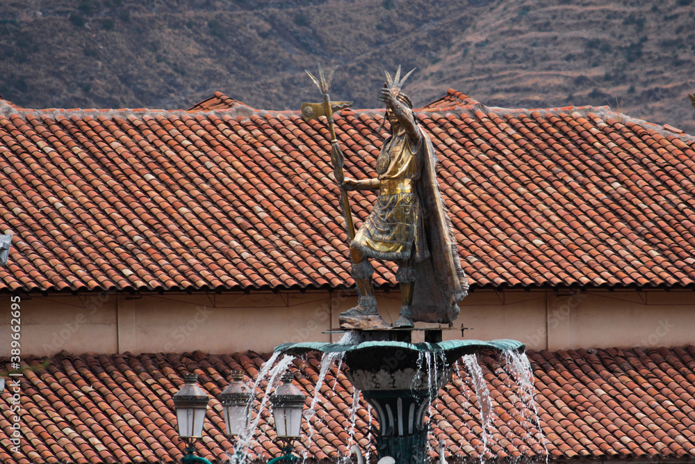 statue of an inka made of bronze in a water fountain Stock Photo ...