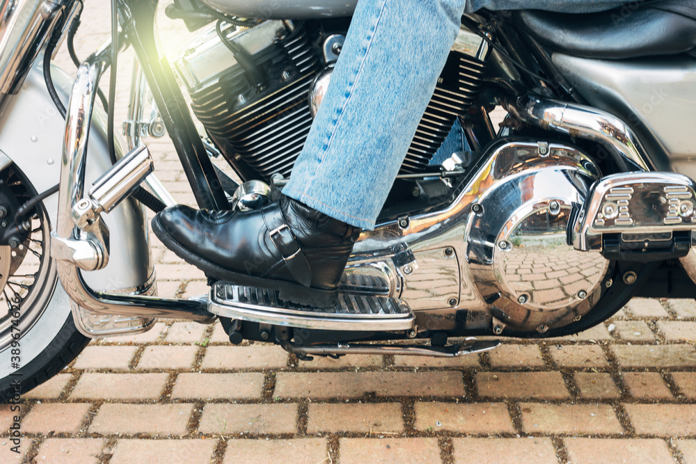 Biker left foot changing gear on custom chopper motorcycle Stock Photo ...