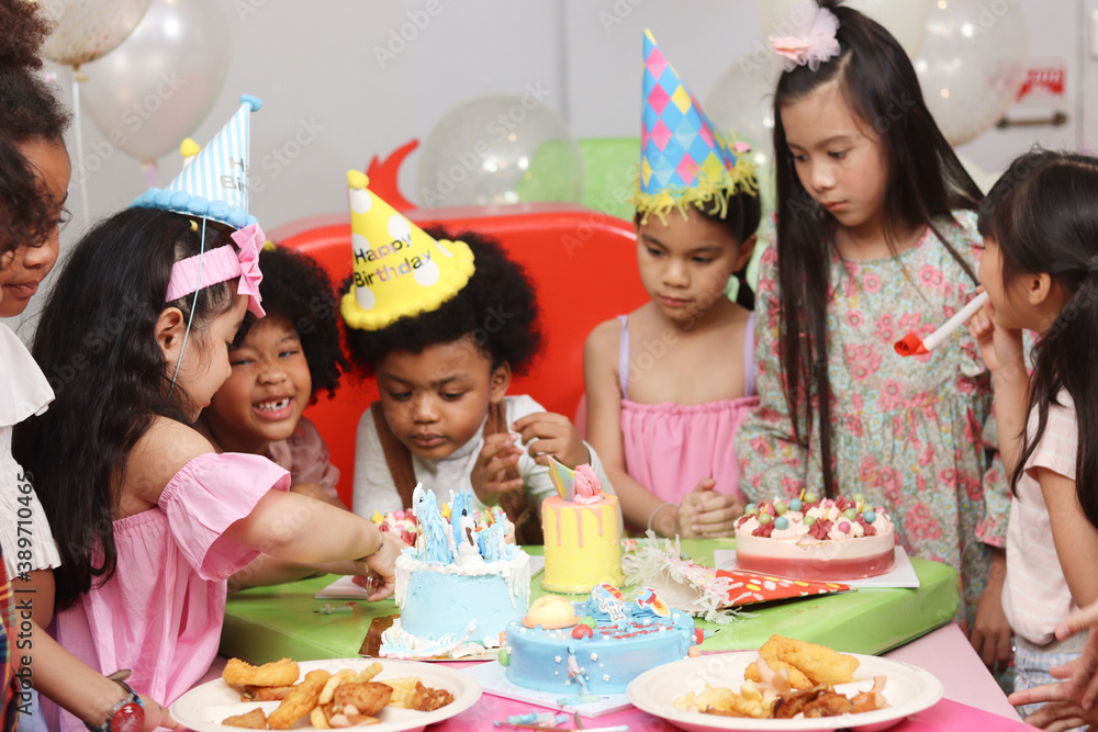 Happy birthday party event, group of adorable kids celebrate birthday ...