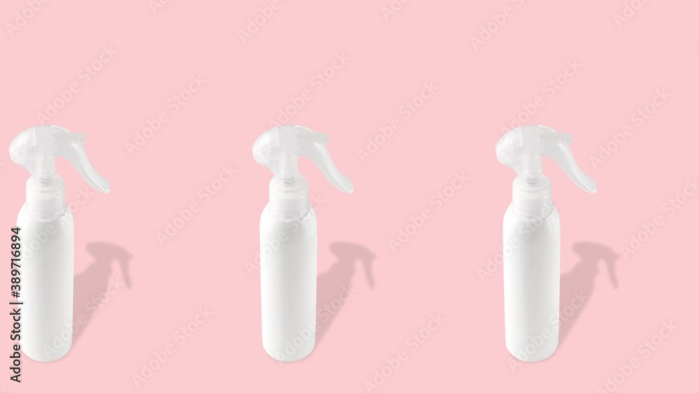 seamless looping animation with one row of white plastic bottles spray ...