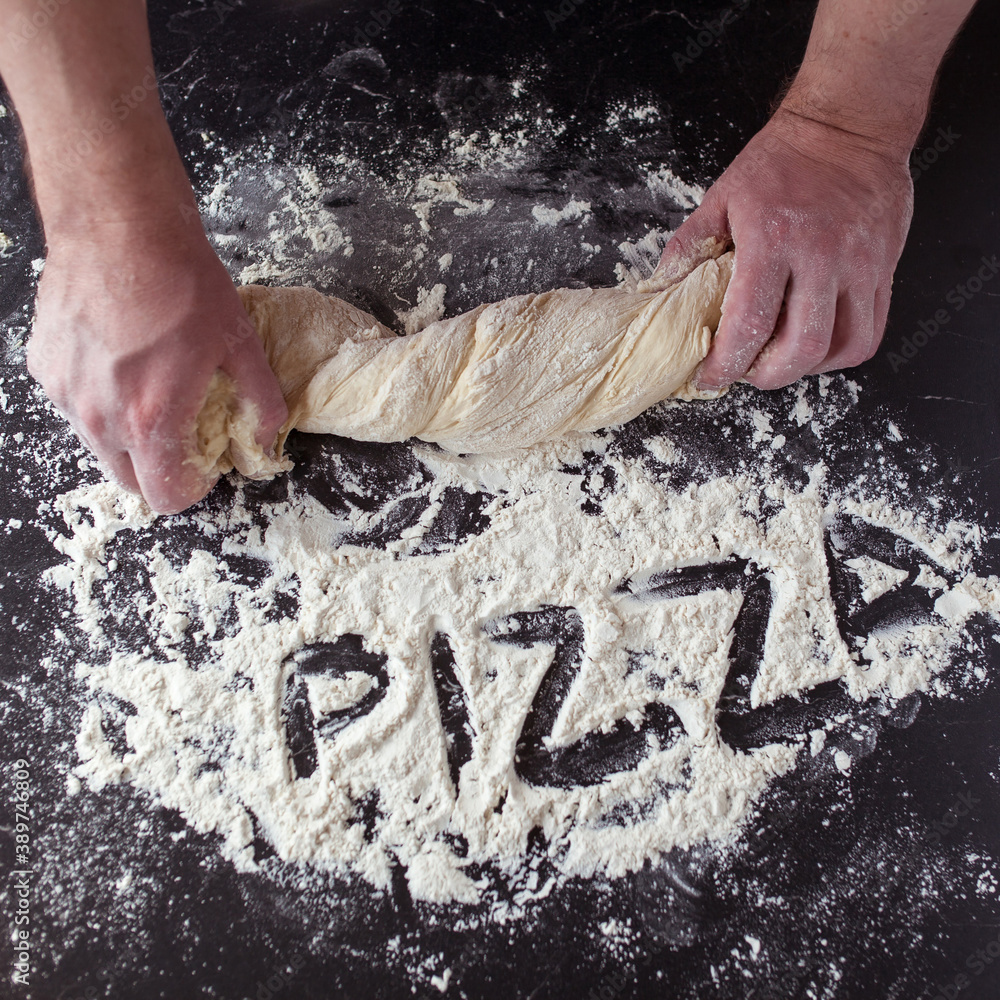 Making pizza at home. Fresh original Italian raw pizza, preparation in ...