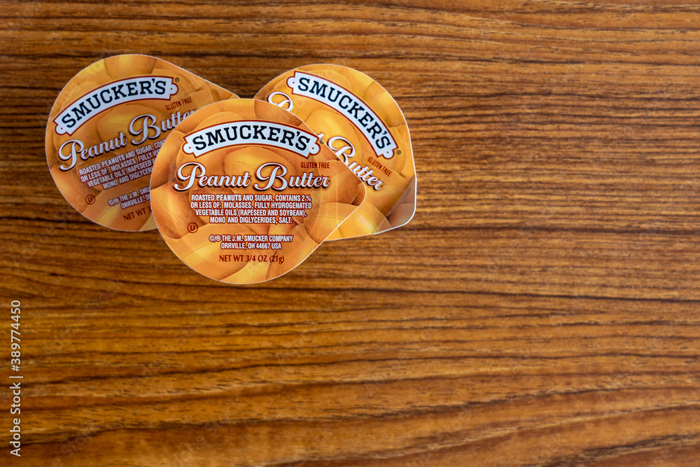 Galloway, NJ - Oct 4, 2020: Three Smucker's Peanut Butter single serve ...