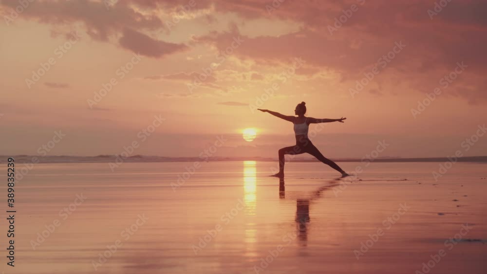 Wide shot of slim unrecognizable female silhouette standing with legs ...