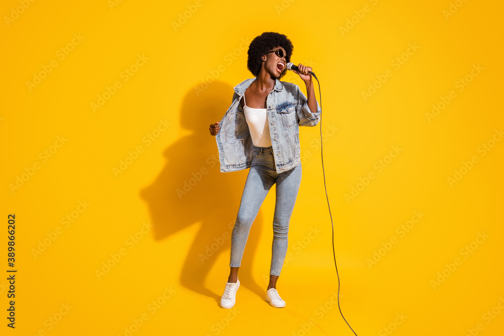 Full length photo of talented lady wear casual denim outfit singing mic ...