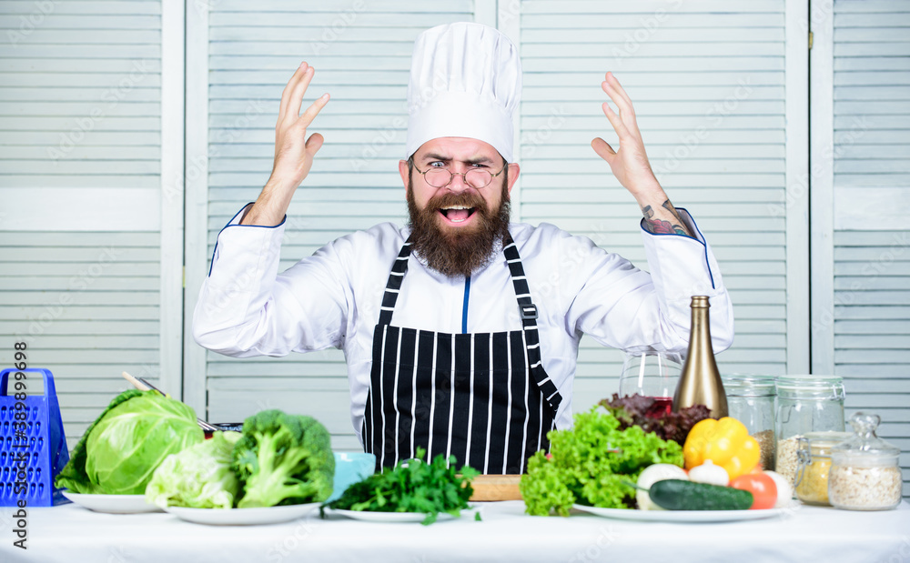 Chef at work starting shift. Guy in professional uniform ready cook ...