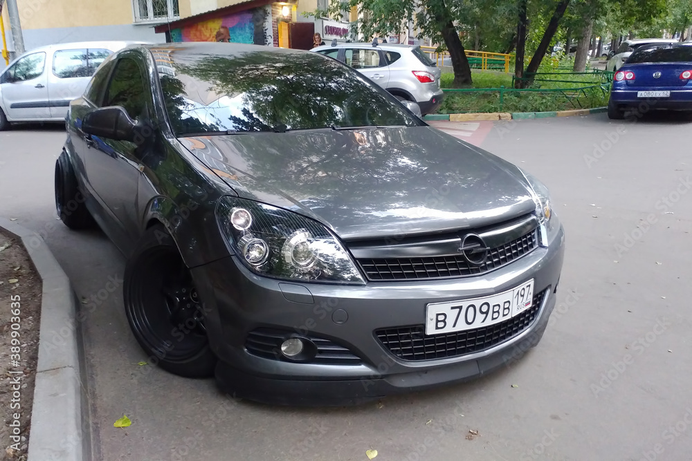 Russia, Moscow - May 04, 2019: Gray metallic Opel Astra modified to ...