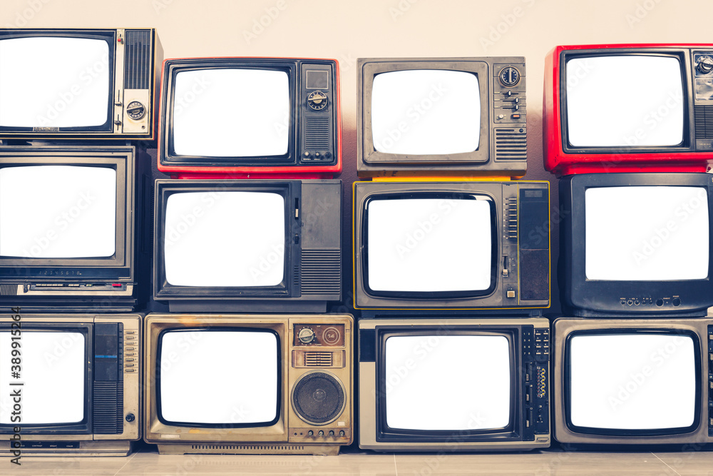 Pile of old retro TVs with cut out screen in room, clipping path ...