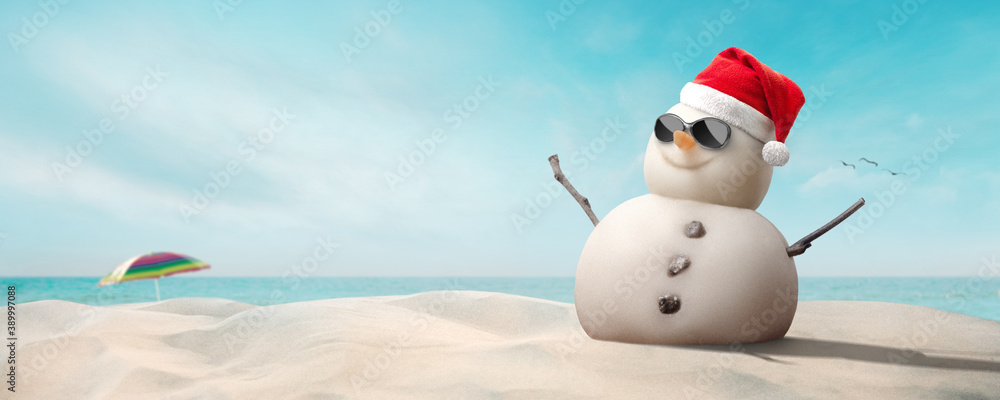 concept - happy sandy snowman with sunglasses and Santa hat on sunny ...