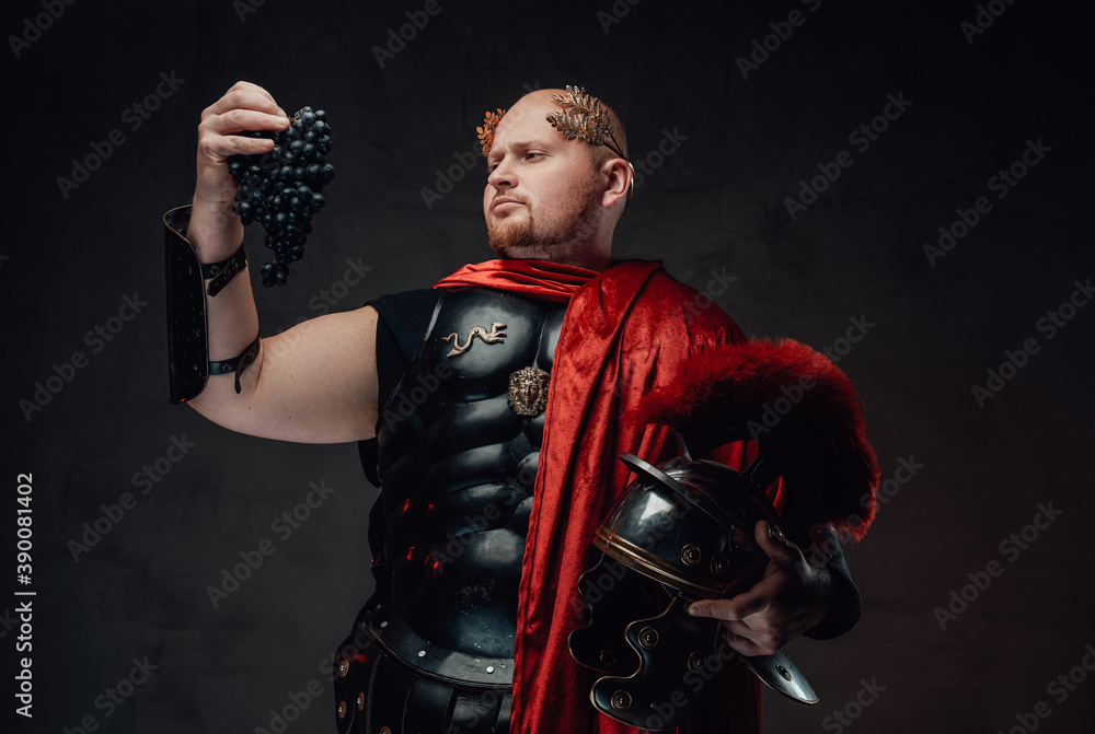 Authoritative and elite roman with helmet and wreath on his bald head ...