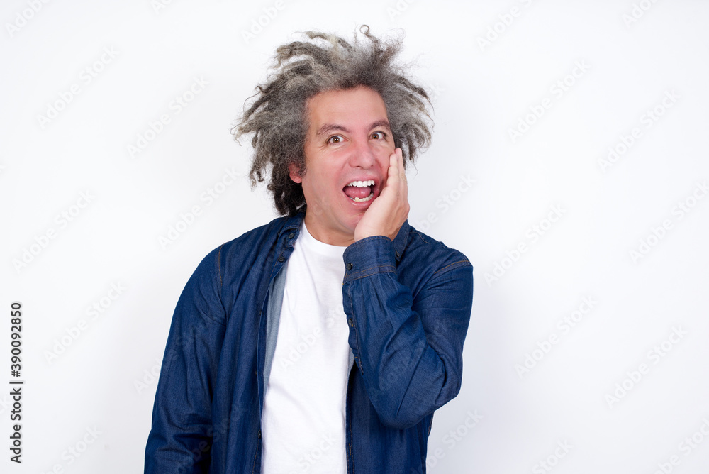 Shocked, astonished Handsome middle aged Caucasian man with afro gray ...