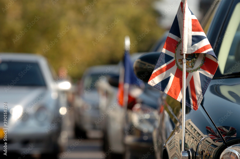 British Ambassador's car with the flag of the Union Jack with the Royal ...