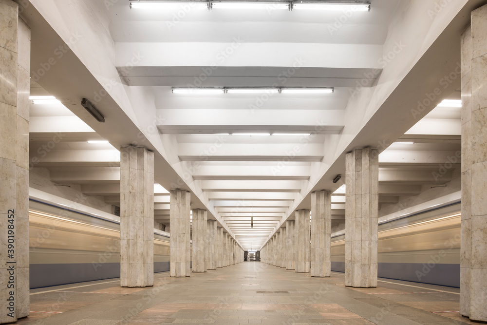 Linear perspective view of an underground station with two rows of ...