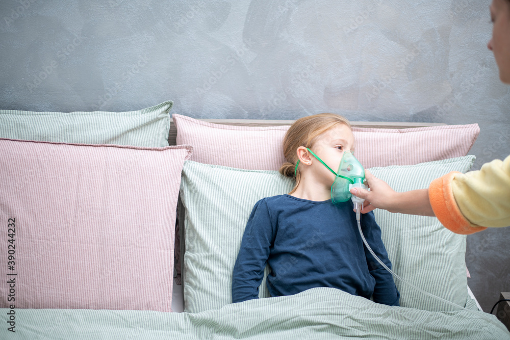 inhalation, aerosol, a 6-year-old girl does inhalation in the ...