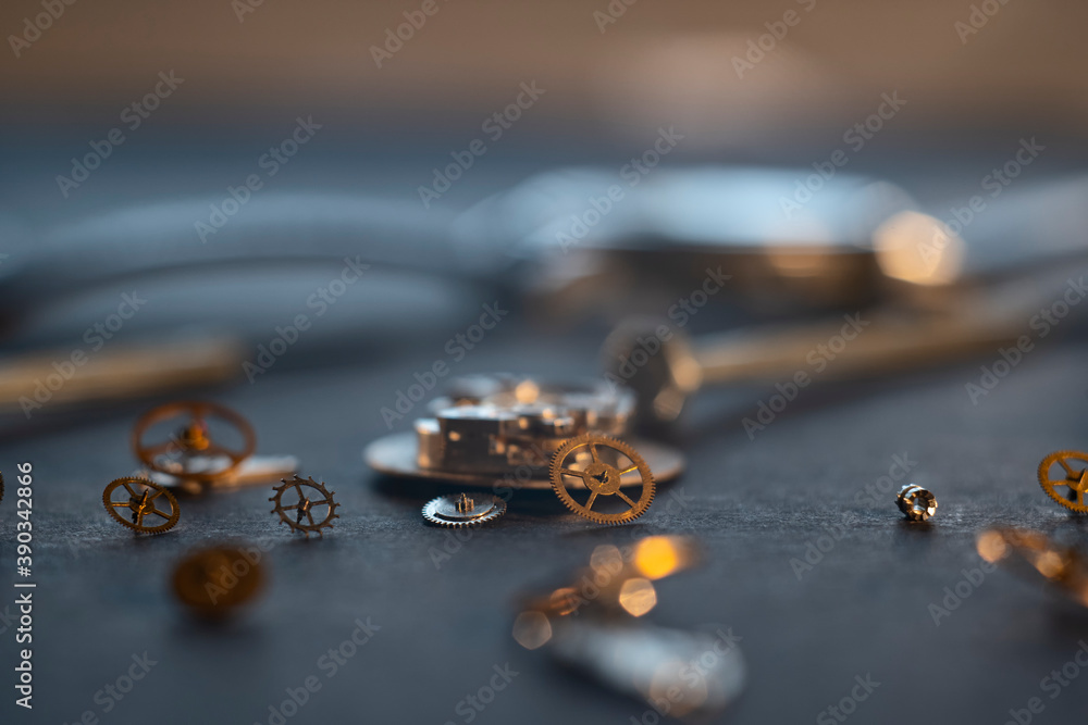 Mechanical watch assembly, watchmaker's workshop with many parts and ...