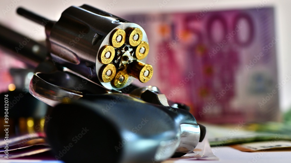 Revolver Smith e Wesson 357 magnum on a background of euro banknotes ...