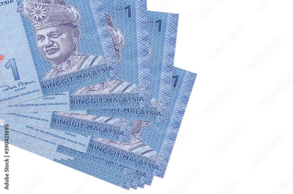 1 Malaysian ringgit bills lies in small bunch or pack isolated on white ...