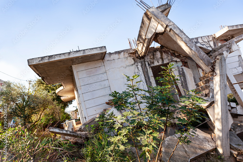 House collapsed during an earthquake. Stock Photo | Adobe Stock
