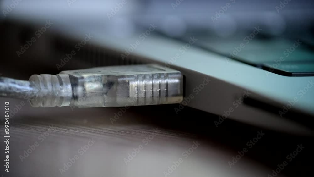 Vidéo Stock Laptop USB connector and USB cable. Human hand disconnects ...