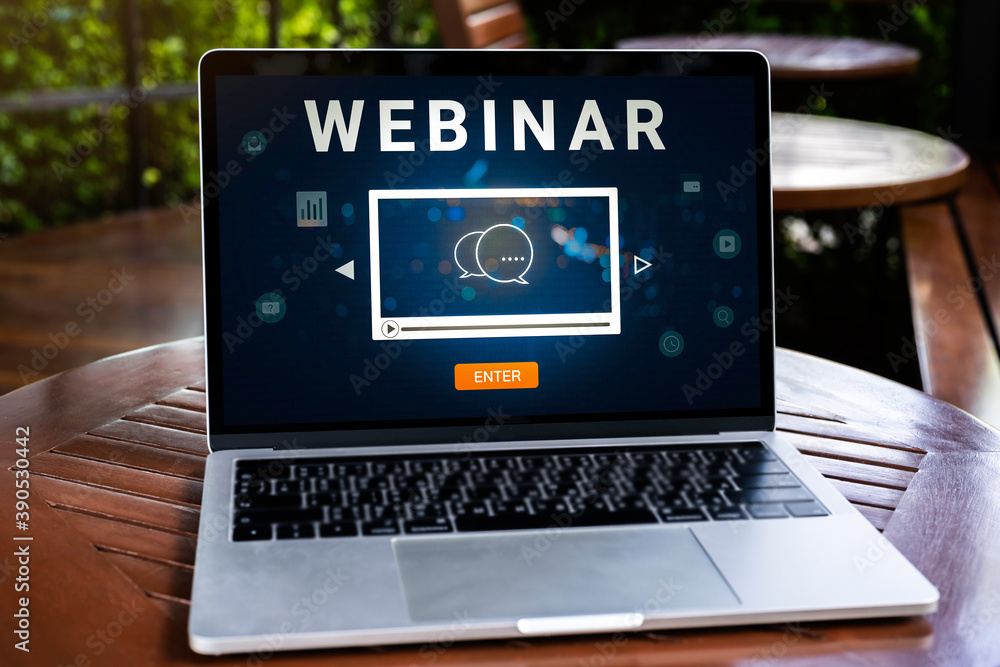 Person using a laptop computer for online training webinars. E-learning ...
