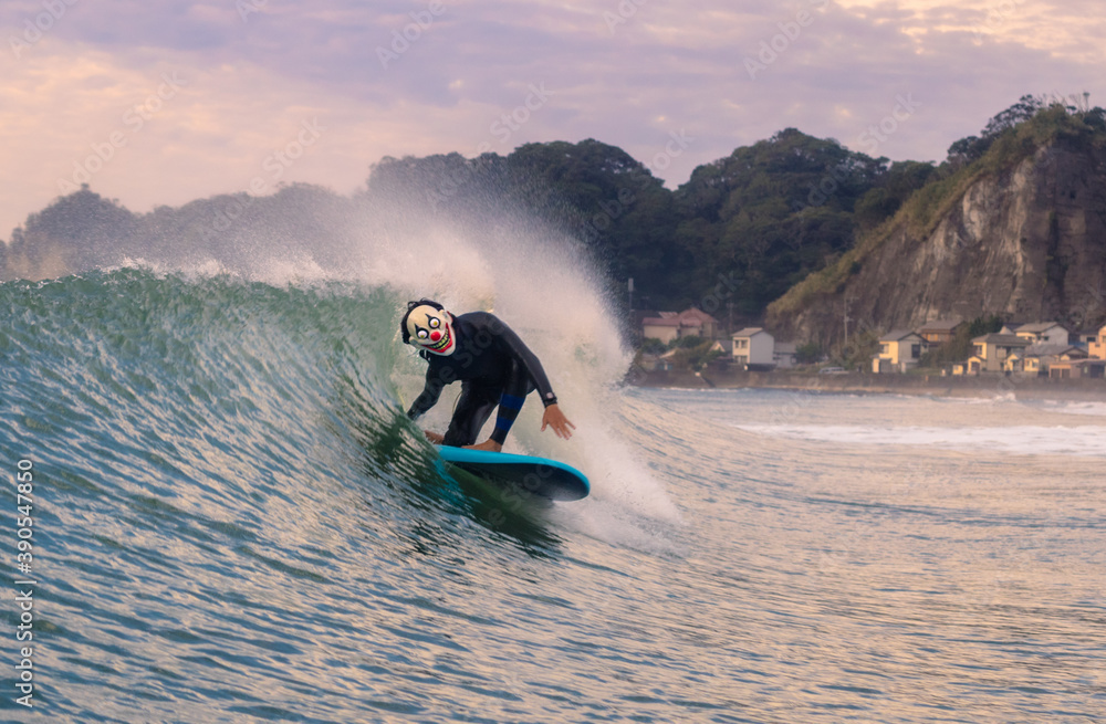 Halloween Costume Surfing Various scary costumes worn by a surfer while ...