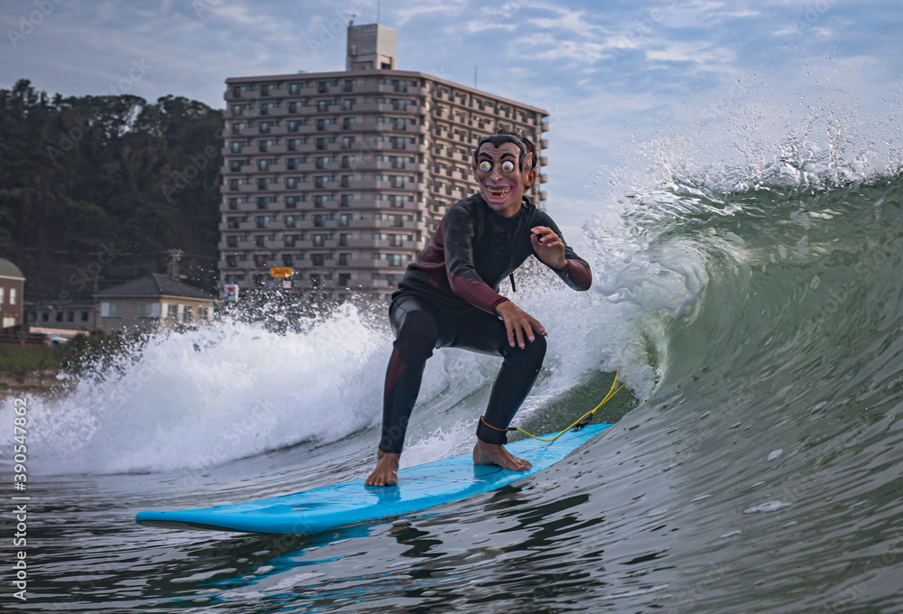 Halloween Costume Surfing Various scary costumes worn by a surfer while ...