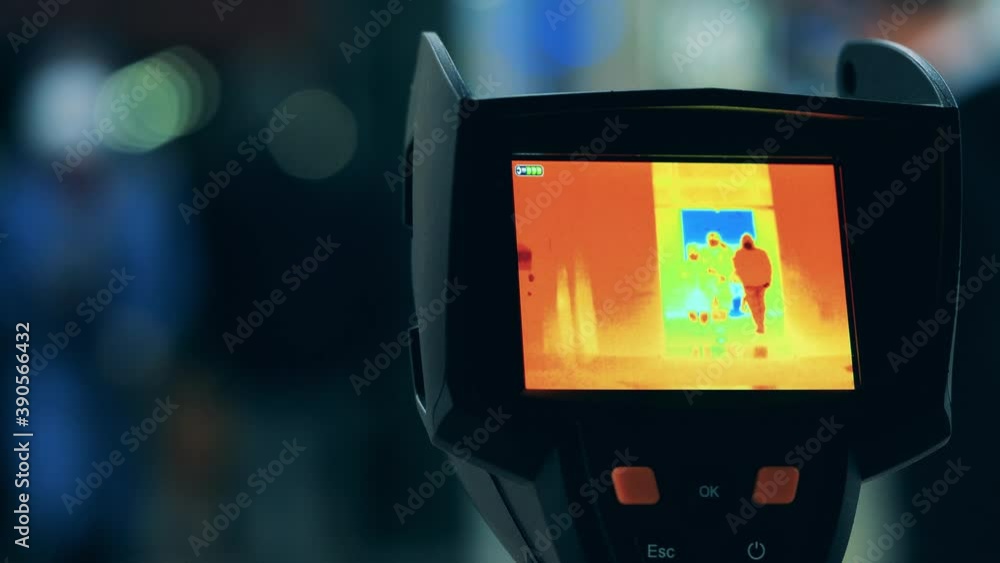 Screen of a thermal camera while scanning passers-by Stock Video ...
