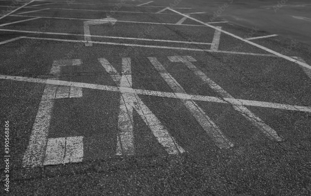 emergency exit sign, showing the direction of escape on the ground ...