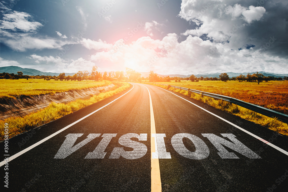 vision written on highway road in the middle of empty asphalt road and ...